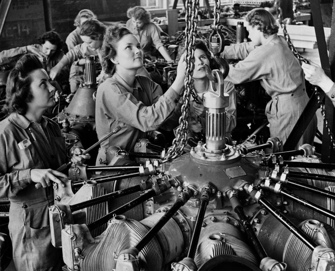 WAVES Lowering an Airplane Engine Onto a Block – Women of World War II